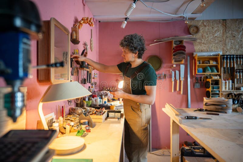 Woodworker Placing Tools Back in Order after Finishing Task, Clearing ...