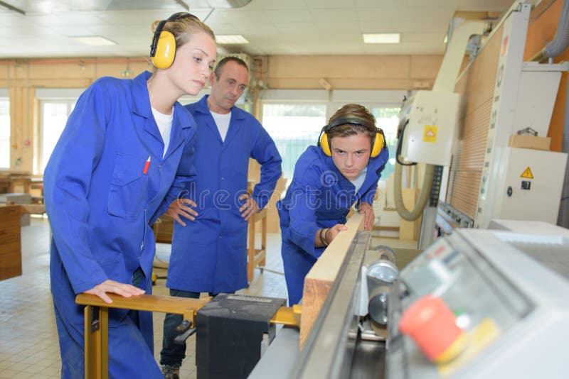 Woodworking Class and Teacher Sanding Wood Stock Photo - Image of level ...