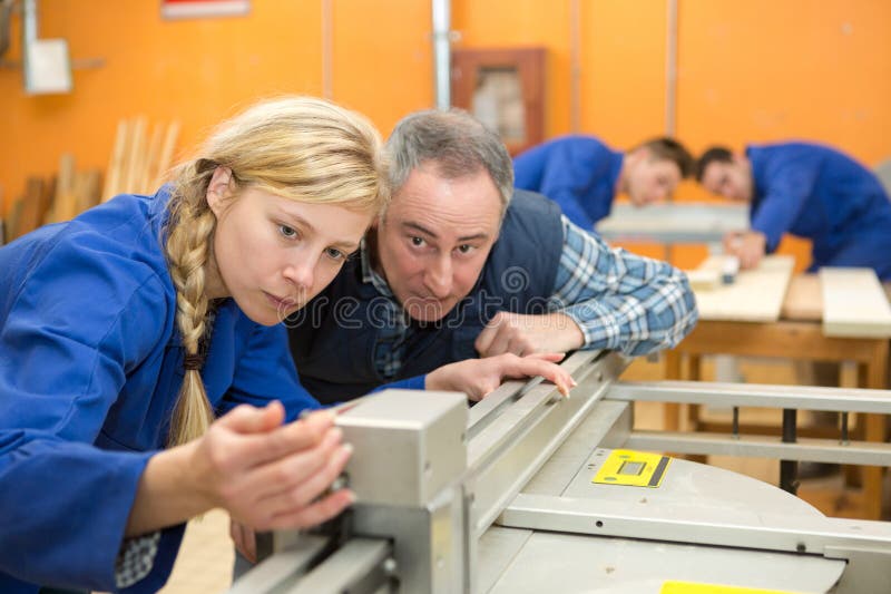 Woodworking Female Apprentice Inspecting Workbench Stock Image - Image ...