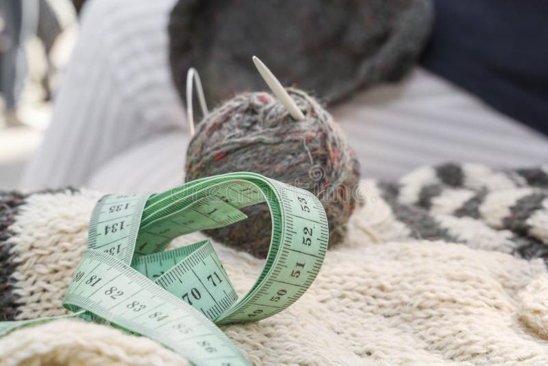 Wool Coats, Knitting Needles, Fabric Meter and Woolen Clothes Stock ...
