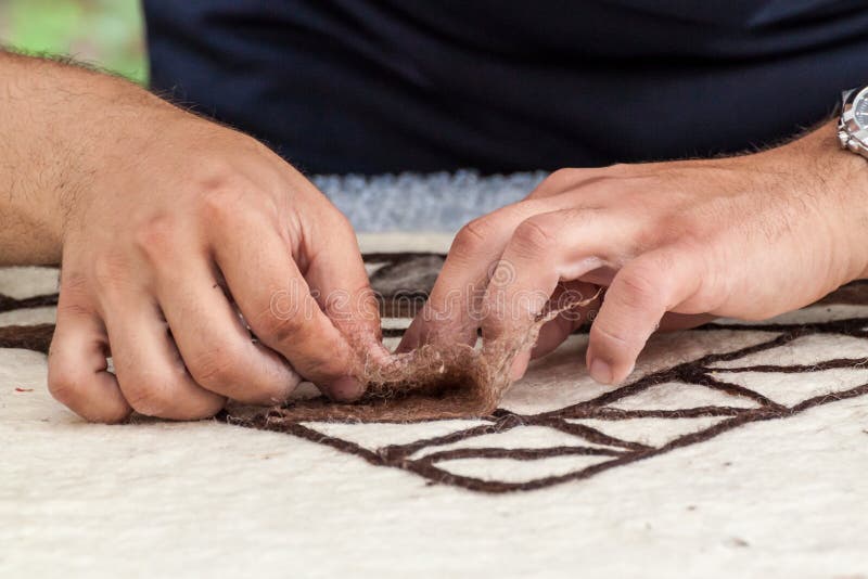 Wool felting stock photo. Image of hand, needle, rolling - 60922576