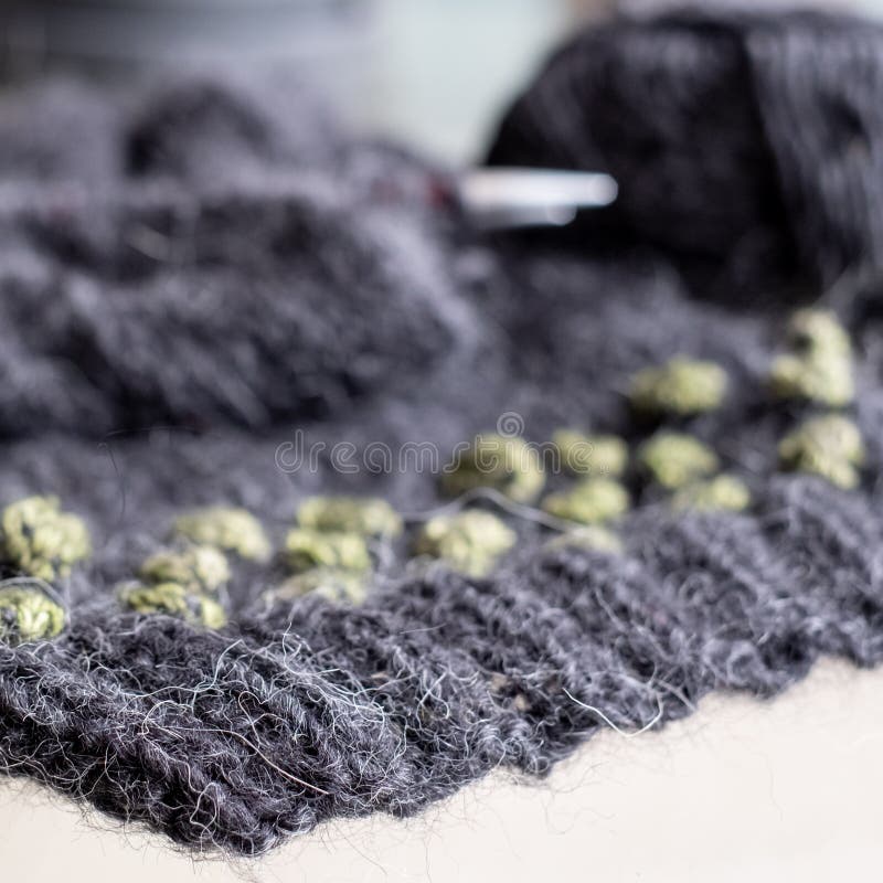 Wool Sweater in the Process of Being Knitted. Photo Shows Textured ...