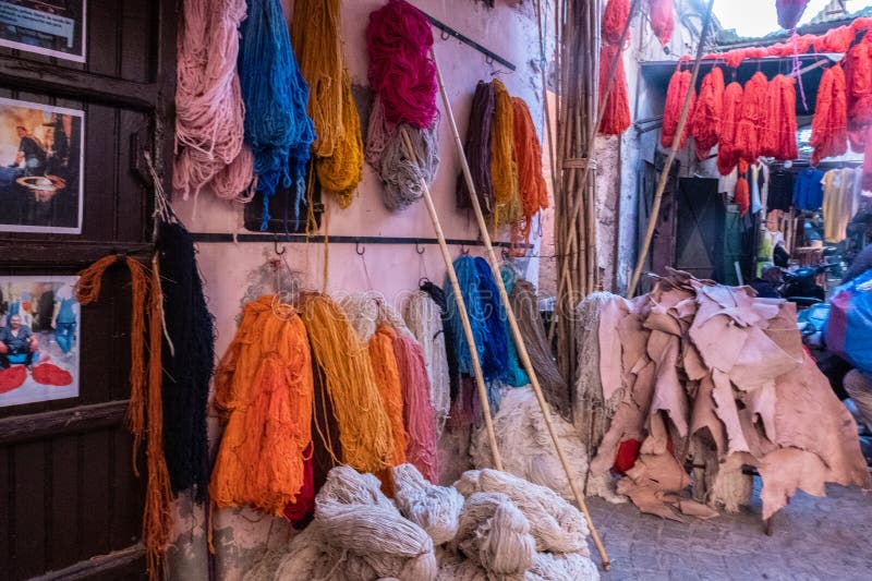 Wool and Threads of Various Colored Materials Hang for Sale in a Souk ...