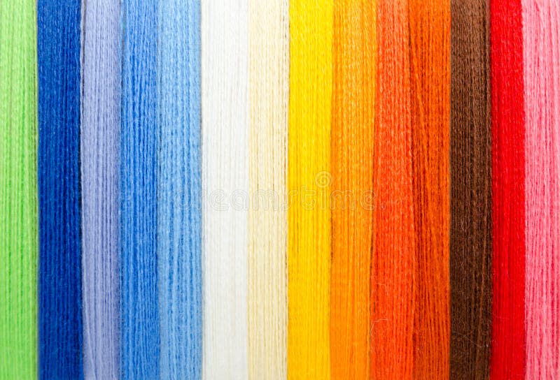 Colorful threads on spools stock photo. Image of craft - 84010800