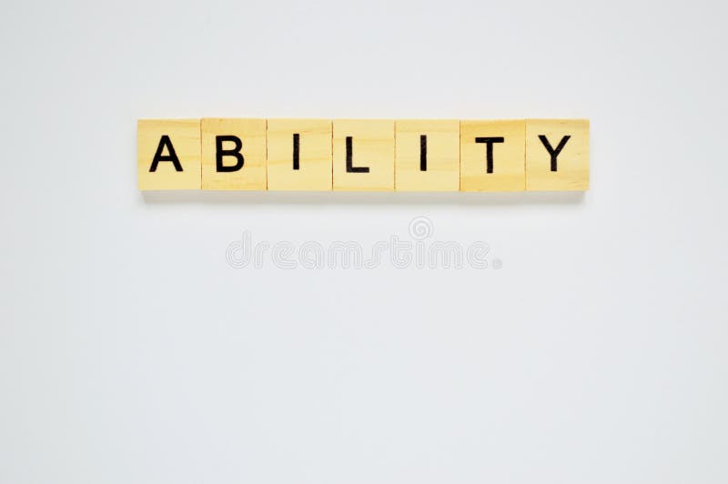 Word Ability. Top View of Wooden Blocks with Letters on White Surface ...
