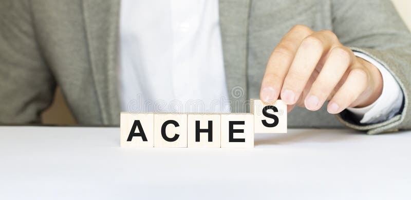 Word Aches Made with Wood Building Blocks Stock Photo - Image of jacket ...