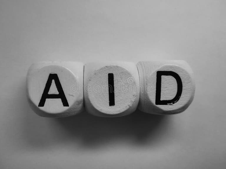 Word aid on wooden dice stock photo. Image of nineteenth - 122886972