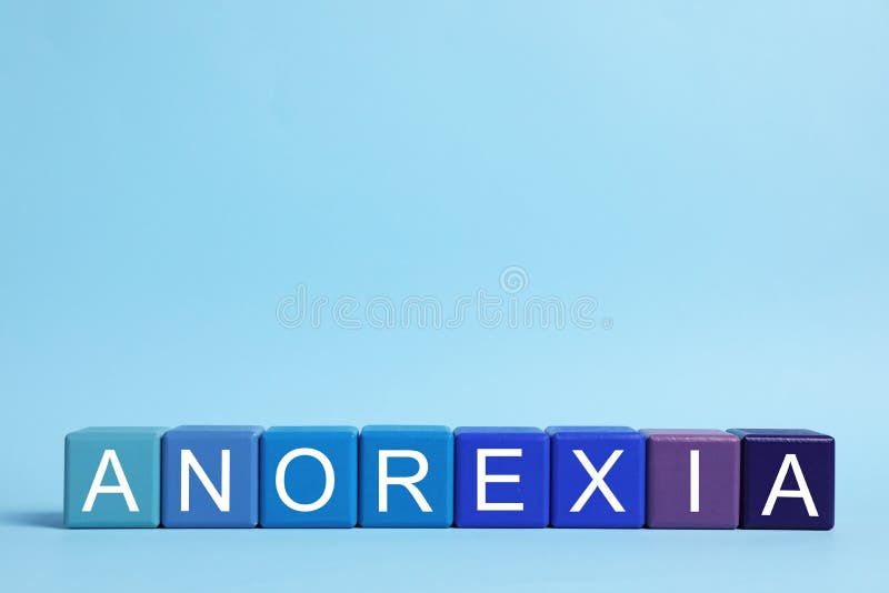 Word Anorexia Made of Wooden Cubes with Letters on Light Background ... Word Anorexia Made of Wooden Cubes with Letters on Light Background ...