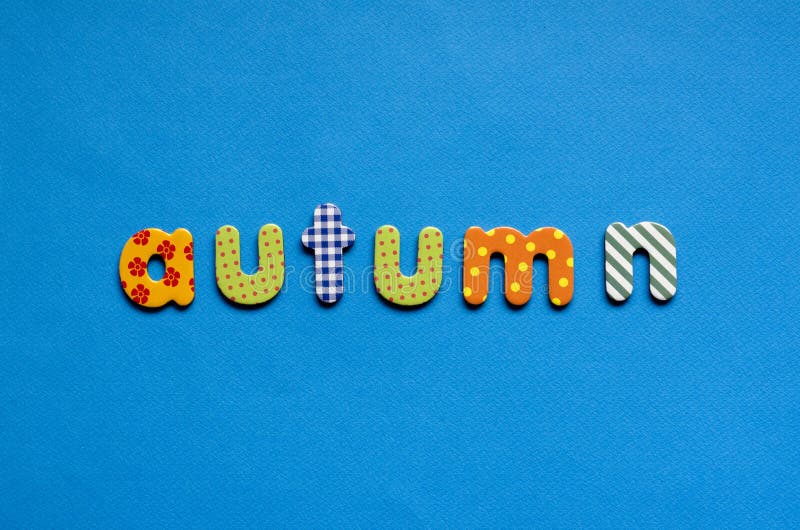 Word Autumn from White Letters with Copy Space on Orange Paper ...