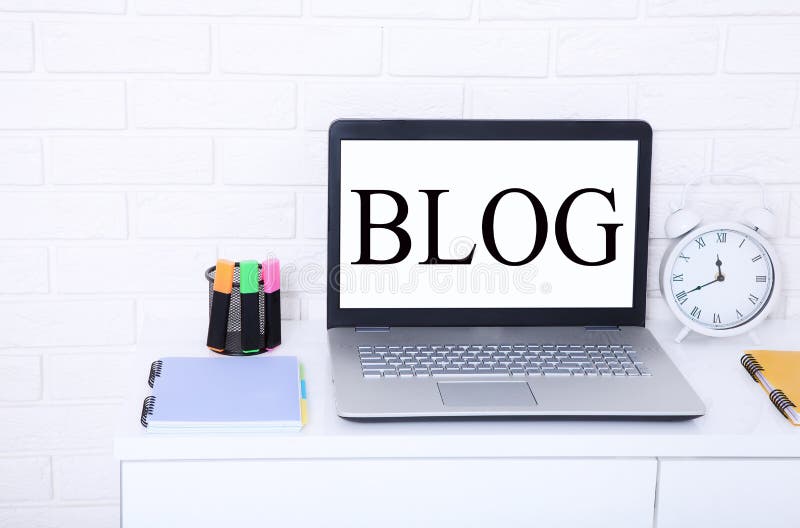 Word Blog on Computer Screen . Workspace with Laptop and Other Work ...