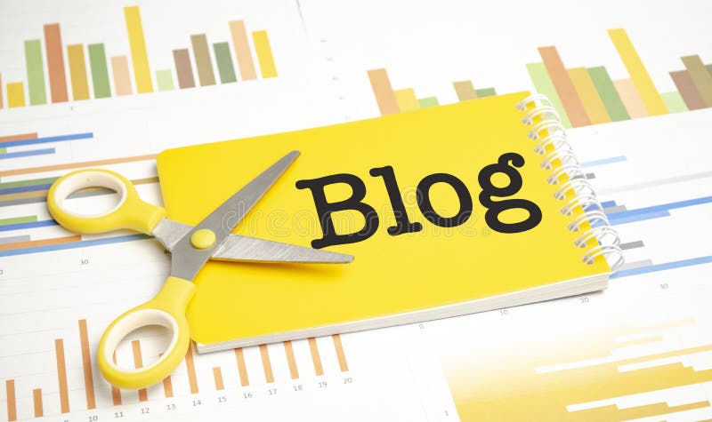 Word Blog on Yellow Notebook and Charts Stock Photo - Image of ...