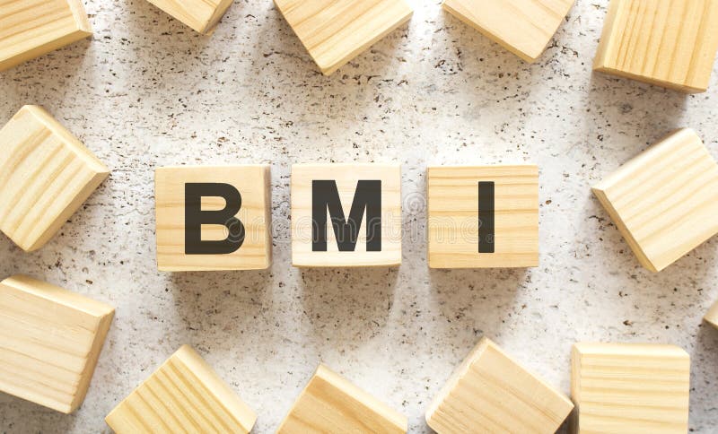 The Word BMI Consists of Wooden Cubes with Letters, Top View on a Light ...