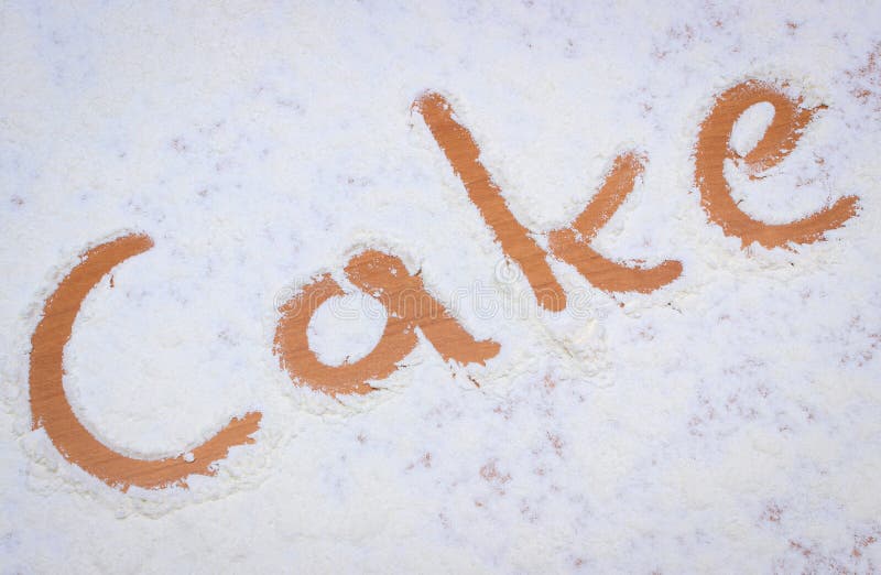 Word Cake Written on White Flour, Black Background Stock Photo - Image ...