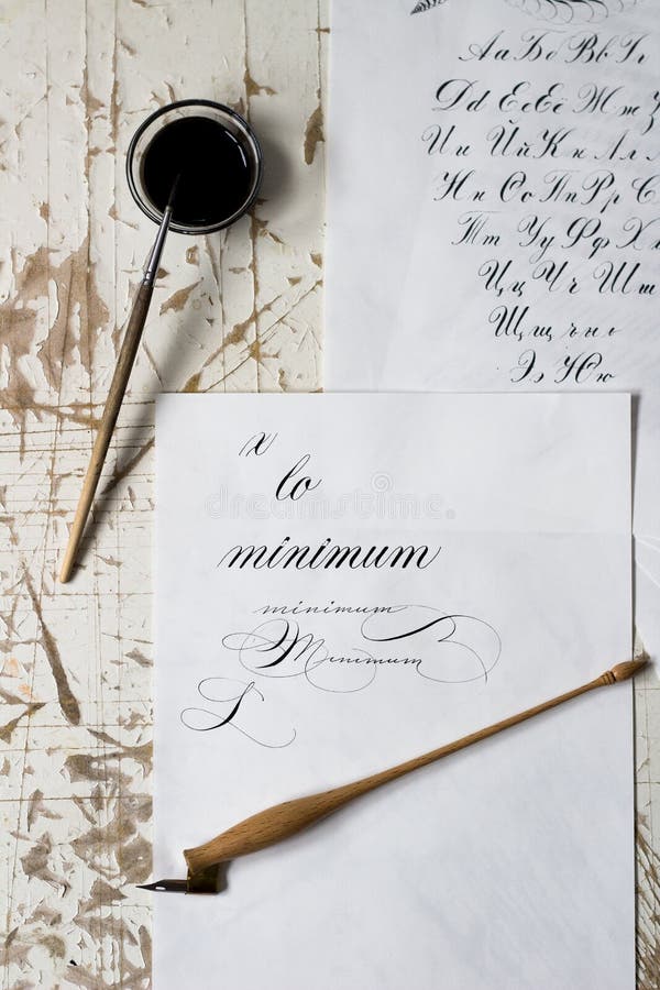 Word Calligraphy Written on Paper, with Calligraphy Tools in Background ...