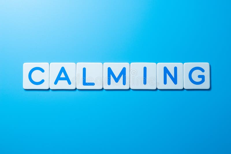 Word CALMING Over a Blue Background,CALMING Concept Stock Image - Image ...