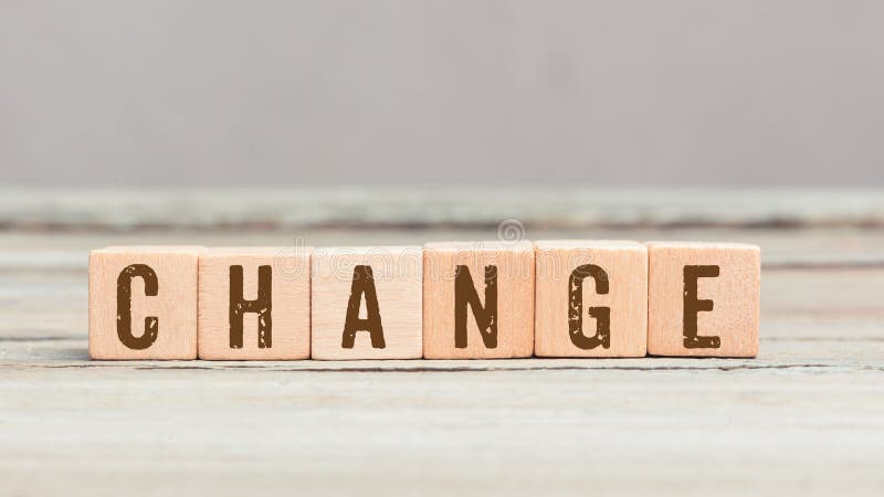 Word Change on wood cubes stock image. Image of term - 257133525