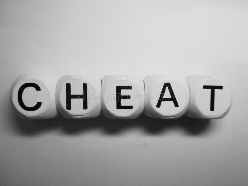 Word cheat spelled on dice stock photo. Image of design - 122774568