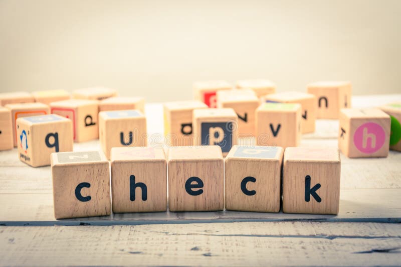 Word ` Check ` Wood Cubic on the Wood Stock Photo - Image of color ...