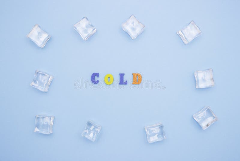 The Word COLD on a Blue Background of Wooden Multicolored Letters, Ice ...