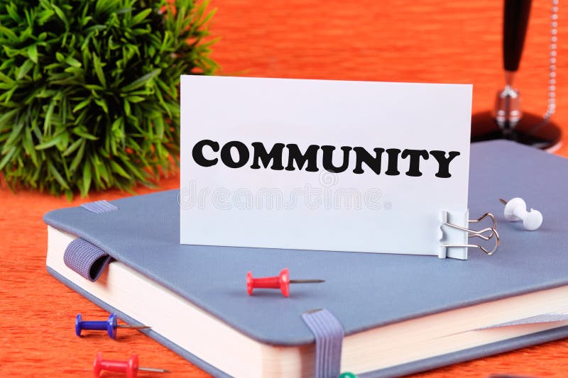 The Word Community Written on a Business Card Standing with a Clip on a ...