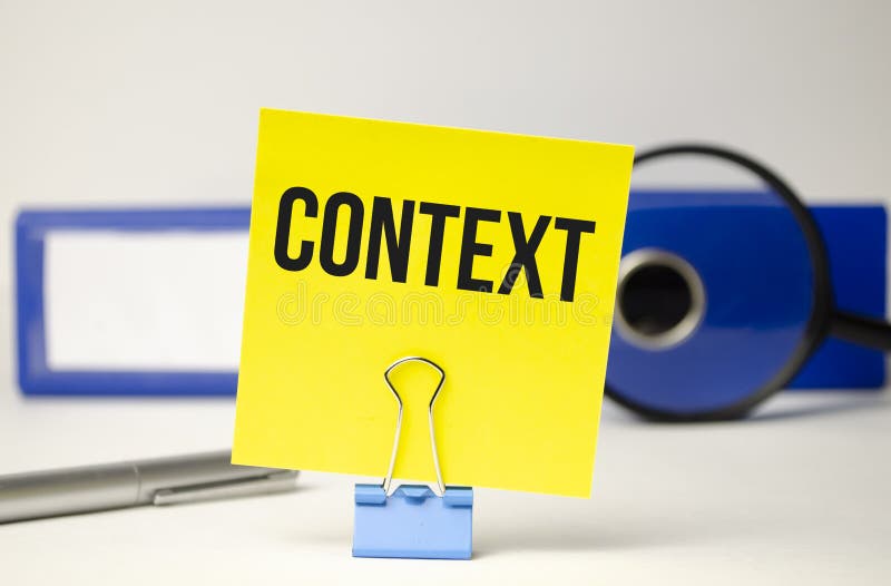 Word Context on Yellow Sticker and Blue Folder Stock Photo - Image of ...