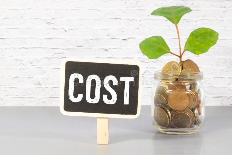 The Word COST is Written on a White Sheet of Computer, Coffee and Red ...