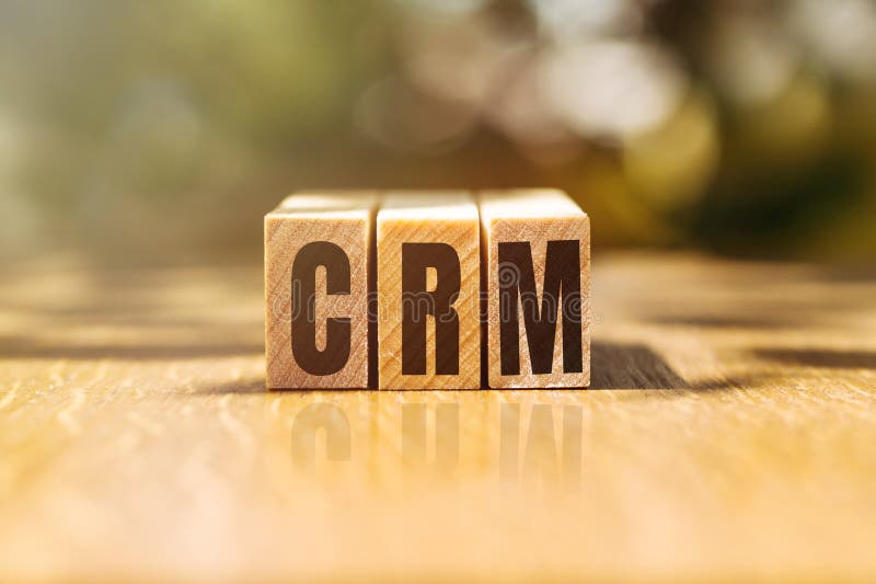 Word CRM Made with Building Wooden Blocks on Table in Sunlight Stock ...