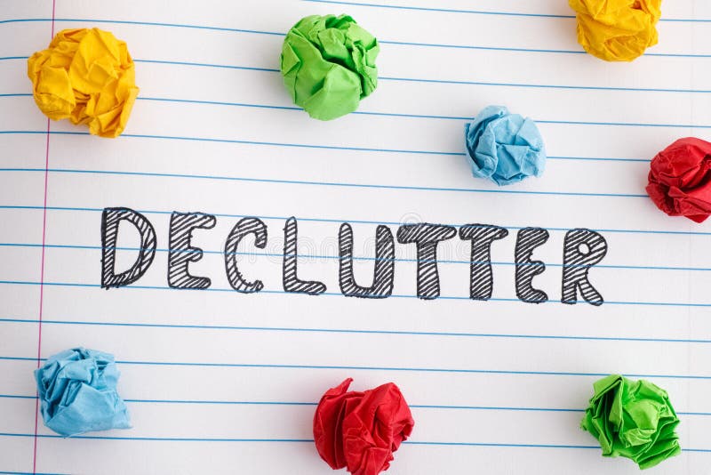 The Word Declutter on Notebook Sheet with Colorful Crumpled Paper Balls ...