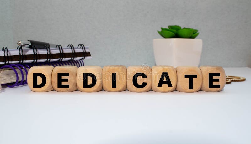 Word Dedicate on a Row of Wooden Blocks. Devotion Dedication Love ... Word Dedicate on a Row of Wooden Blocks. Devotion Dedication Love ...