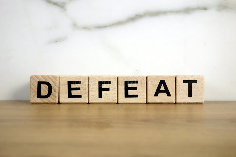 Word Defeat from Wooden Blocks Stock Photo - Image of message, overcome ...