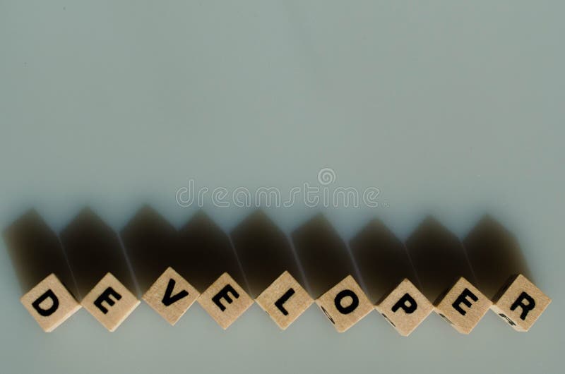The Word Developer Written in Cubes Stock Photo - Image of grey ...
