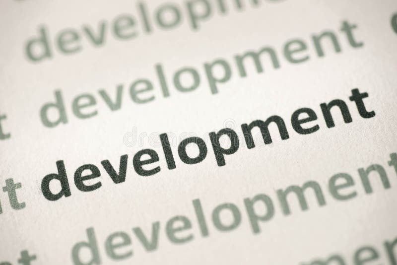 Word Development Written by a Hand Stock Photo - Image of technology ...