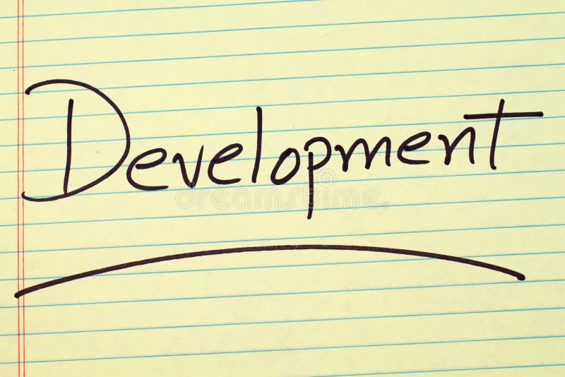 Development on a Yellow Legal Pad Stock Photo - Image of business ...