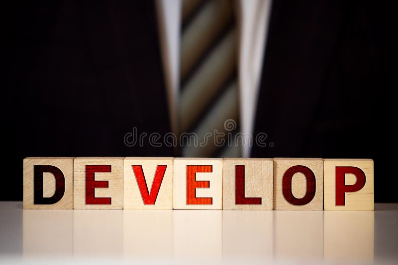 Word Development Written by a Hand Stock Photo - Image of technology ...