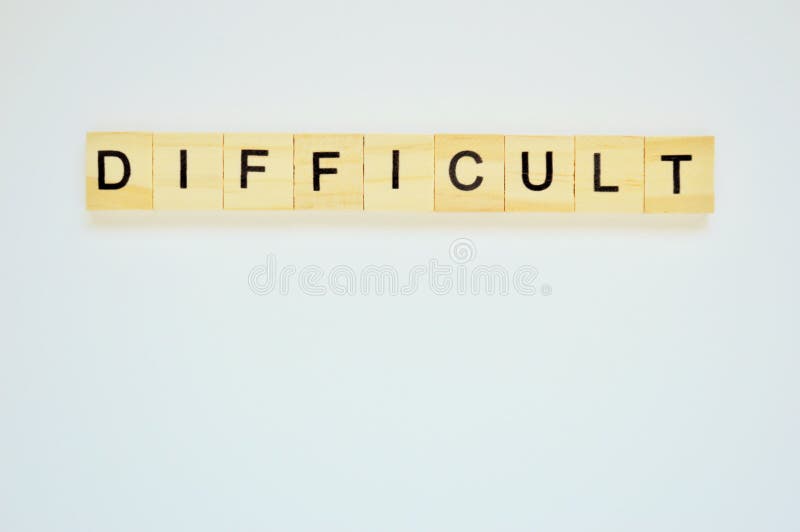 Word Difficult. Top View of Wooden Blocks with Letters on White Surface ...