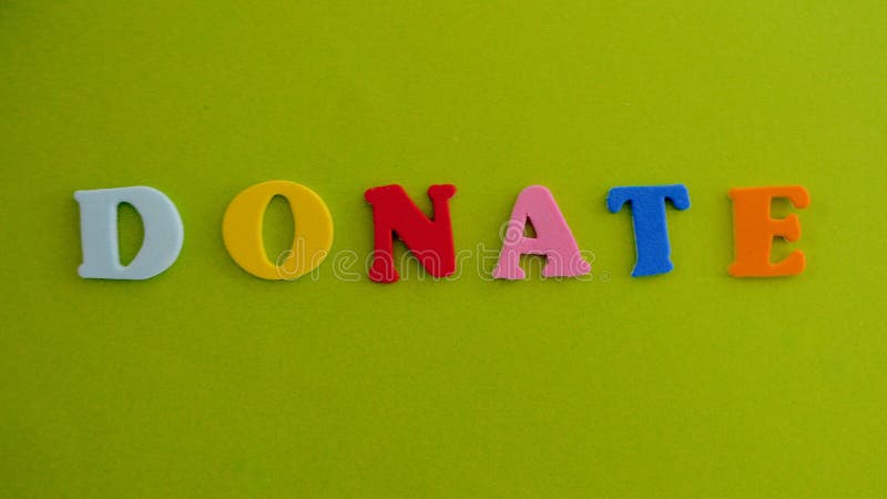 The Word DONATE Written Against a Green Background Stock Image - Image ...