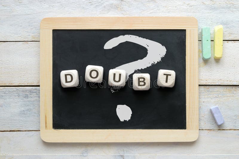 The Word DOUBT and the Question Mark Written on a Blackboard. Stock ...
