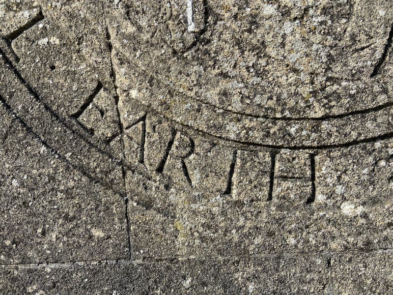 Word Earth Carved or Etched Embossed in Stone Stock Photo - Image of ...