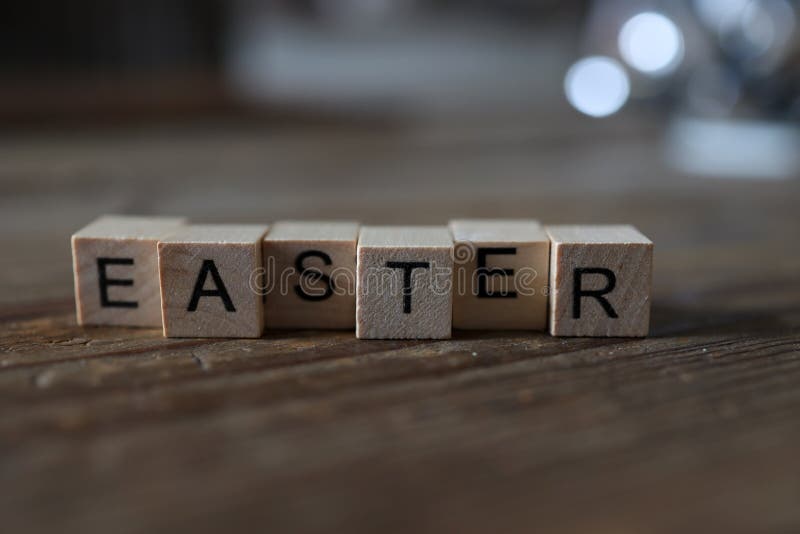 The Word EASTER is Laid Out from Wooden Cubes Stock Photo - Image of ...