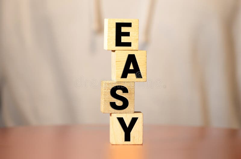 Word Easy from Wooden Blocks on the Road Stock Photo - Image of text ...