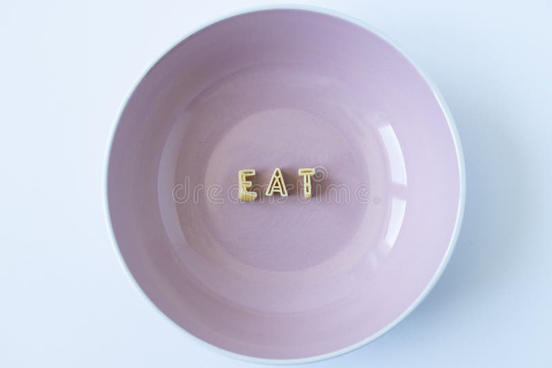 The Word `eat` Made with Pasta Letters Stock Image - Image of ...