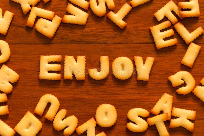 The Word Enjoy Written with Cracker Stock Image - Image of wood ...