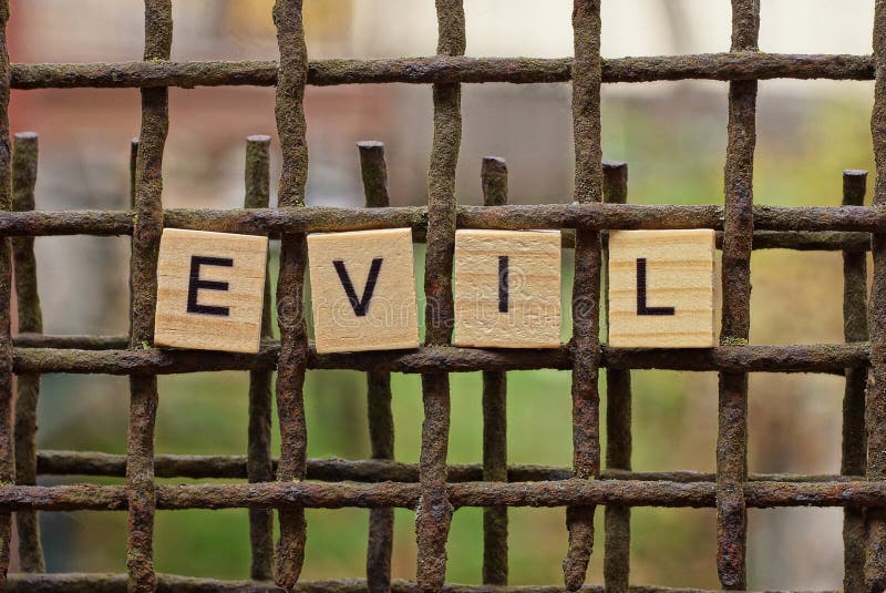 Evil letters in ink stock image. Image of evil, letters - 225954835