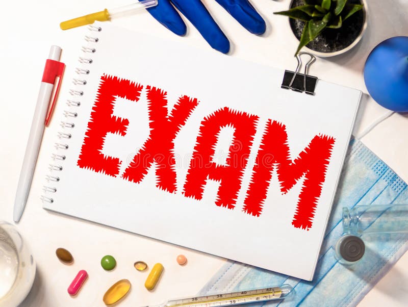 The Word Exam is Written on Wooden Cubes Near a Stethoscope on a Gray ...