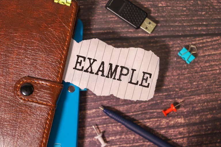 The Word EXAMPLE is Written in the Notebook with Office Tools and Cup ...