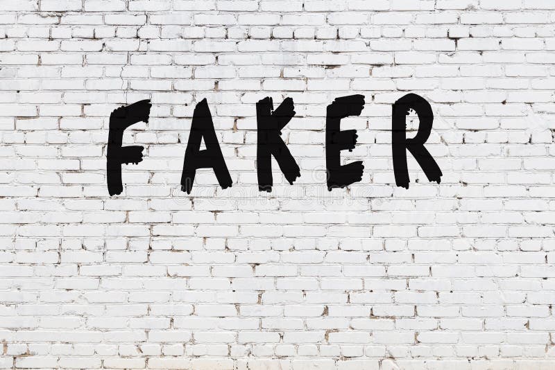 Word Faker Painted on White Brick Wall Stock Image - Image of reminder ...