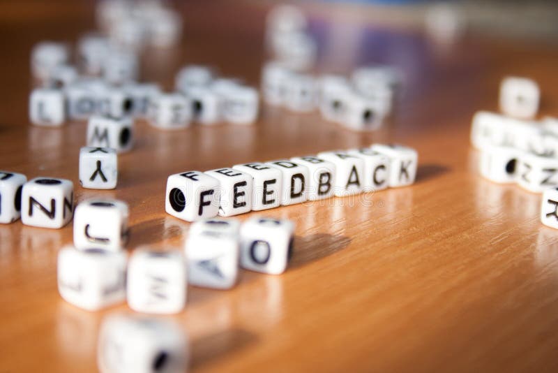 The Word FEEDBACK Made of White Plastic Blocks on the Table Stock Photo ...