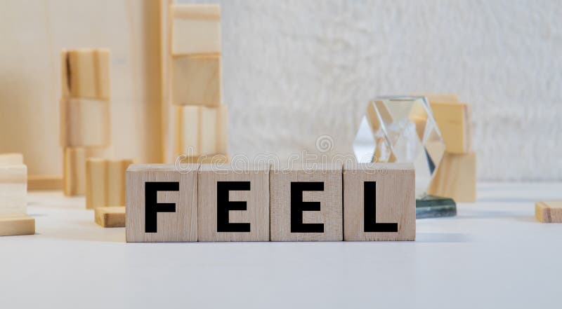 The Word FEEL Written on Wood Cube. Stock Photo - Image of symbol, dice ...