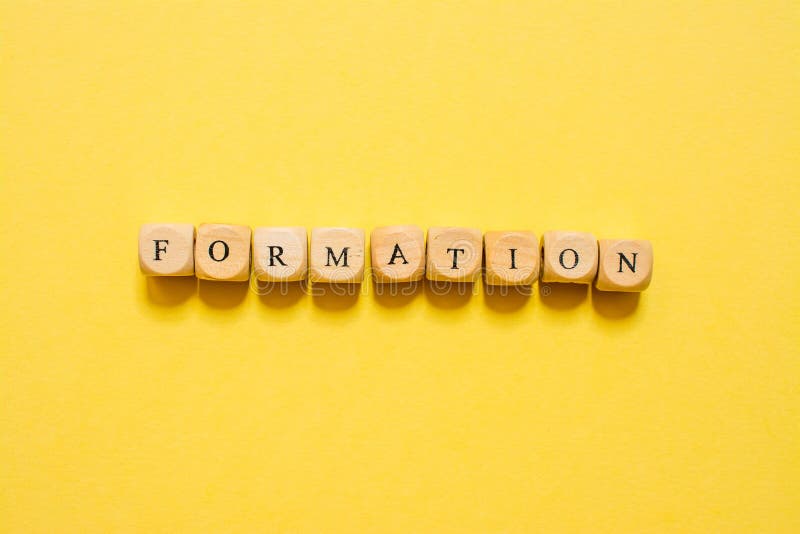 The Word Formation, Text Made with Dice on Yellow Background Stock ...