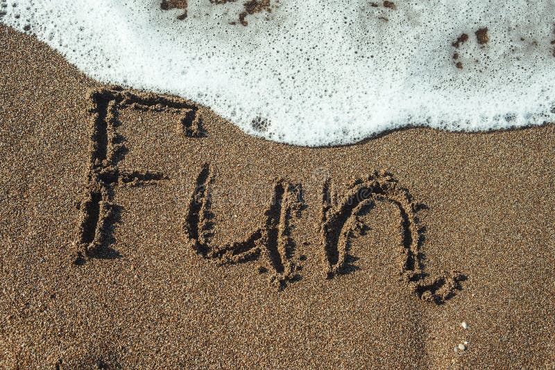 Word fun written in sand. stock image. Image of happiness - 82837971
